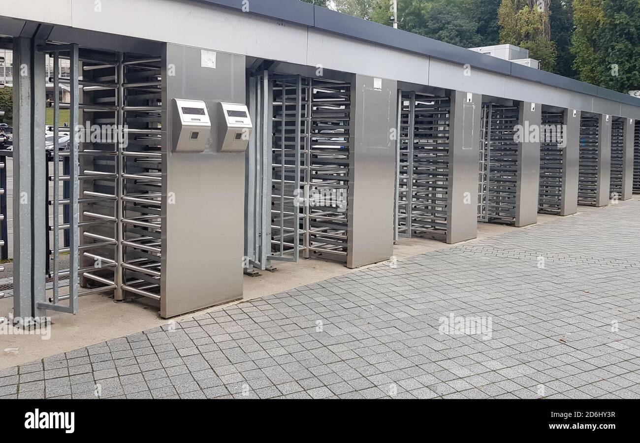 Entrance to the football stadium during the day without people. Secure ...