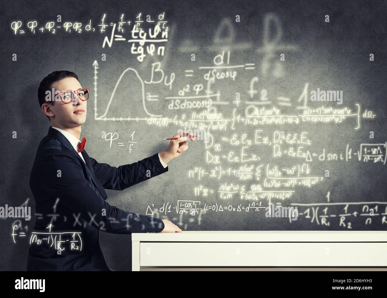 Student drawing science formulas Stock Photo - Alamy