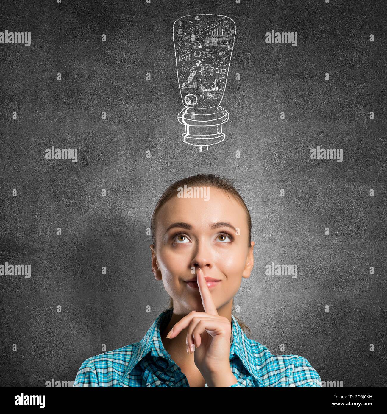 Girl showing hush gesture Stock Photo - Alamy