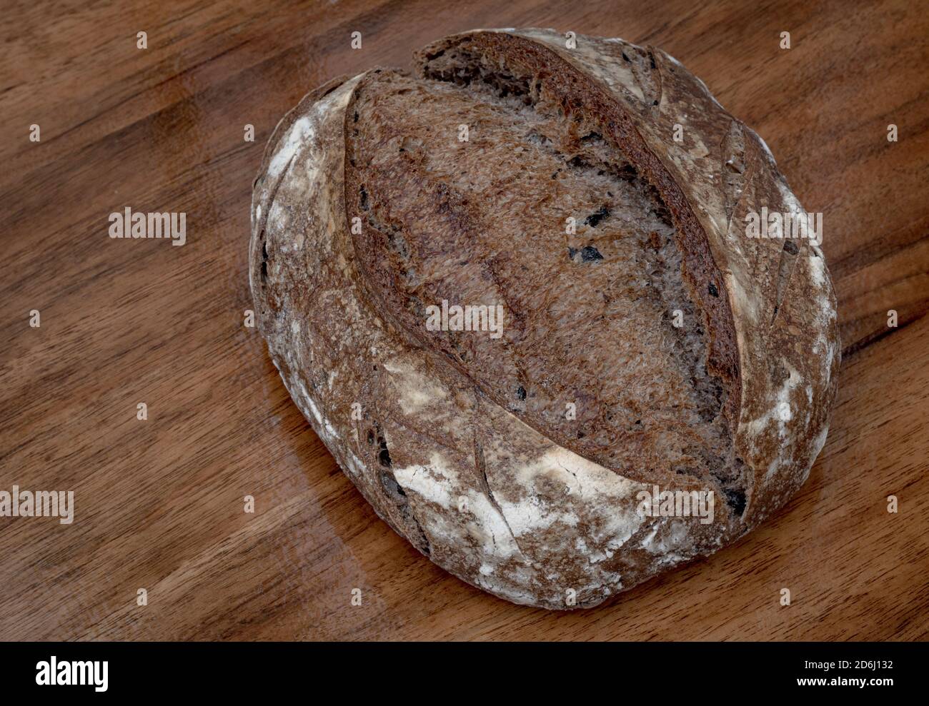 handmade loaves of dark flour bread, dark bread, close up Stock Photo ...