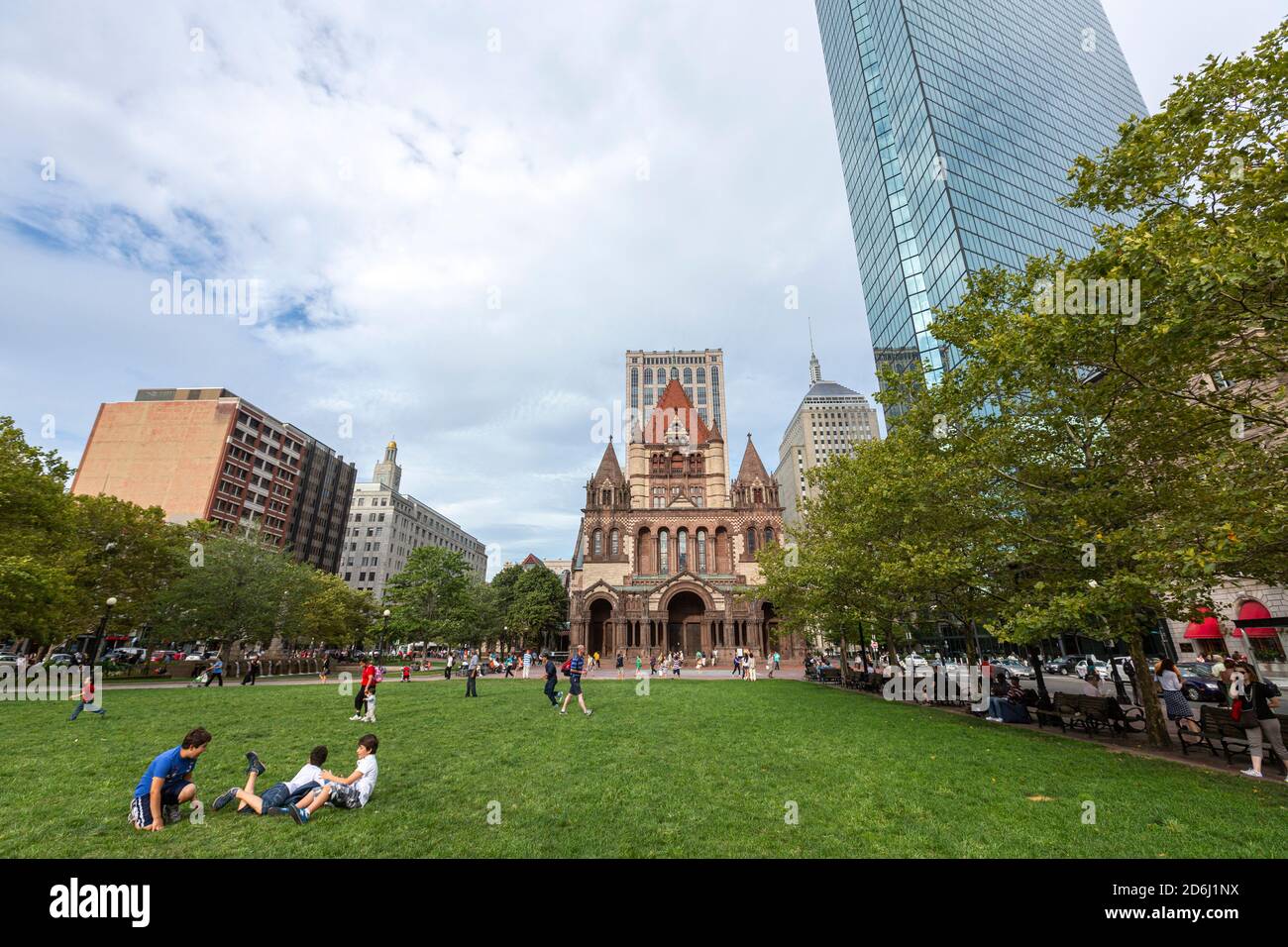 Trinity Church and John Hancock Tower in Copley Square, Boston ...