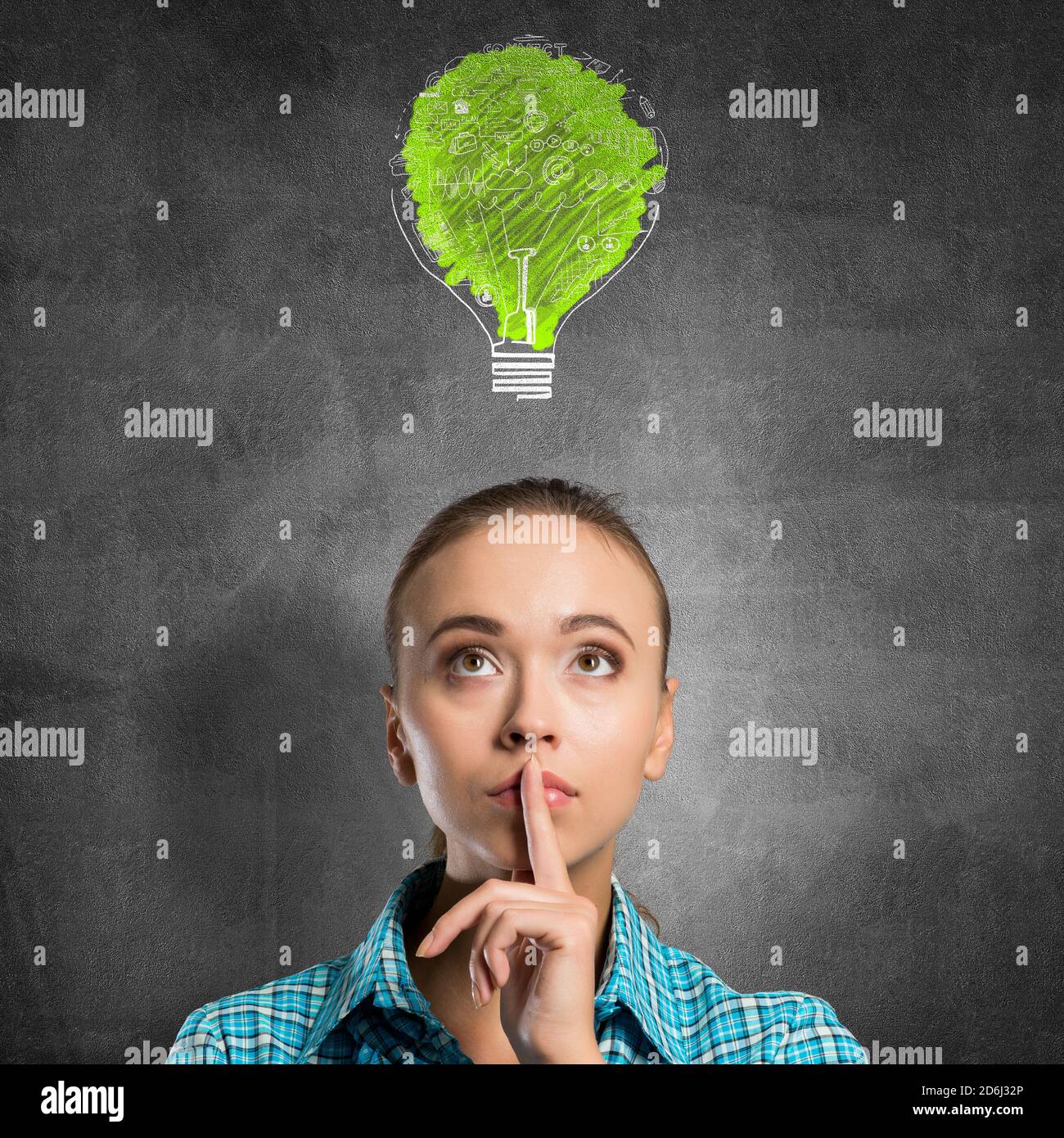 Girl showing hush gesture Stock Photo - Alamy