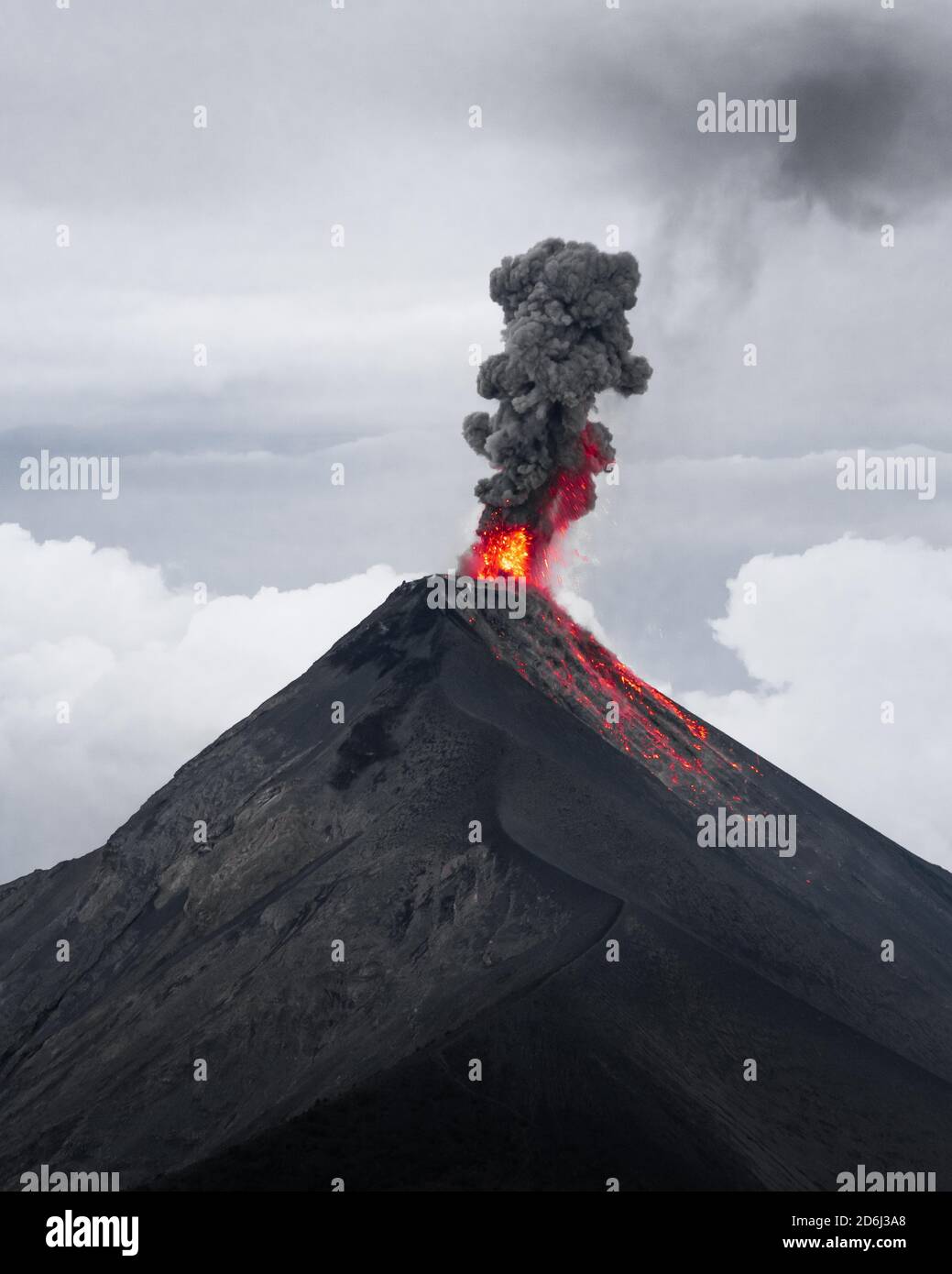 Glowing lava and smoke spitting volcano, volcanic eruption, Volcan de ...