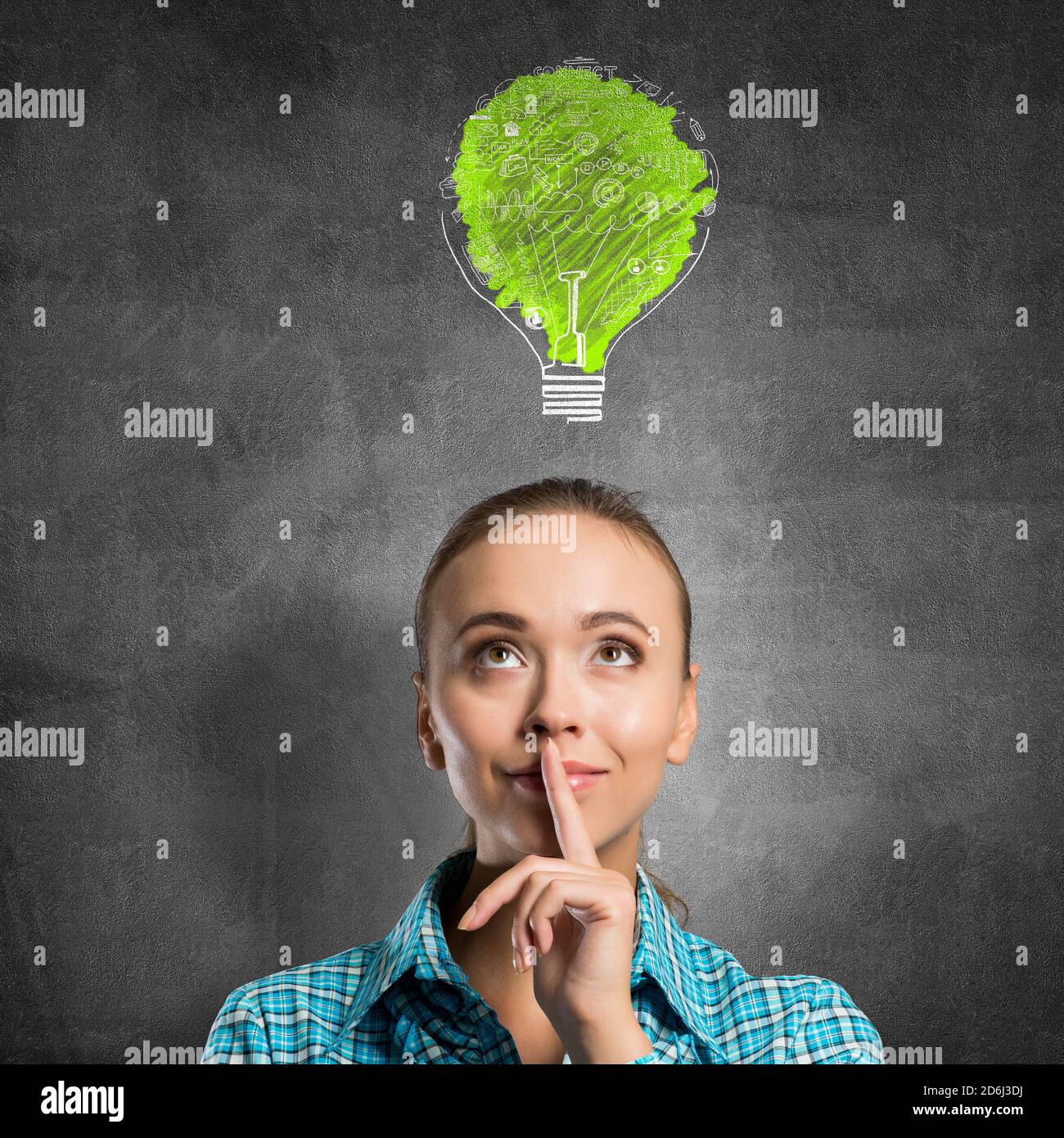Girl showing hush gesture Stock Photo - Alamy