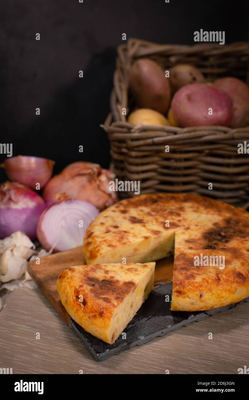 Closeup of a tasty looking pie with potatoes and onions in the studio ...