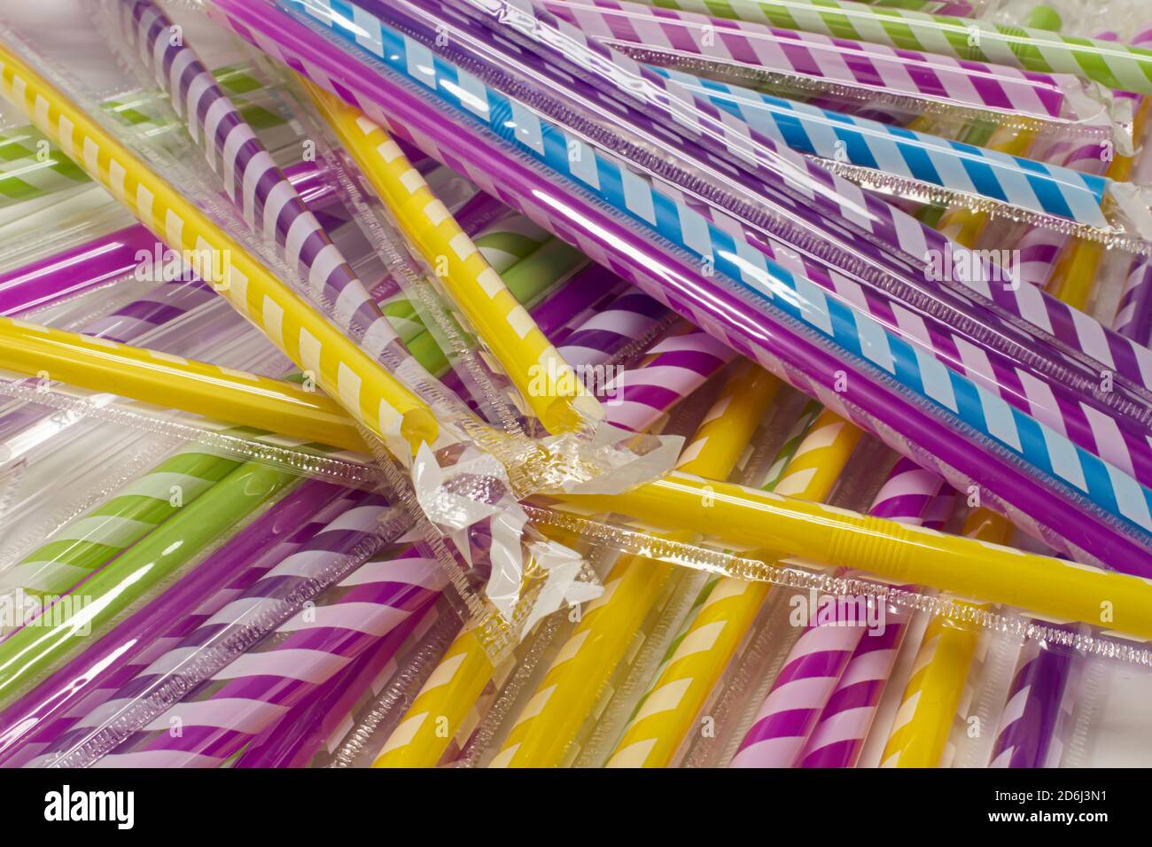 Colorful plastic drinking straws in transparent packaging Stock Photo ...