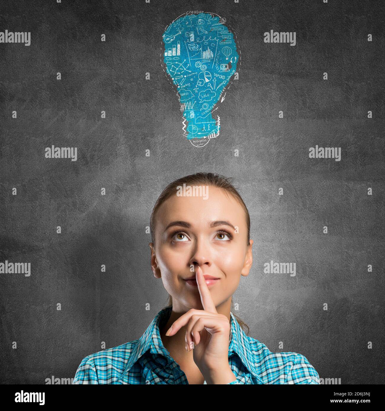 Girl showing hush gesture Stock Photo - Alamy