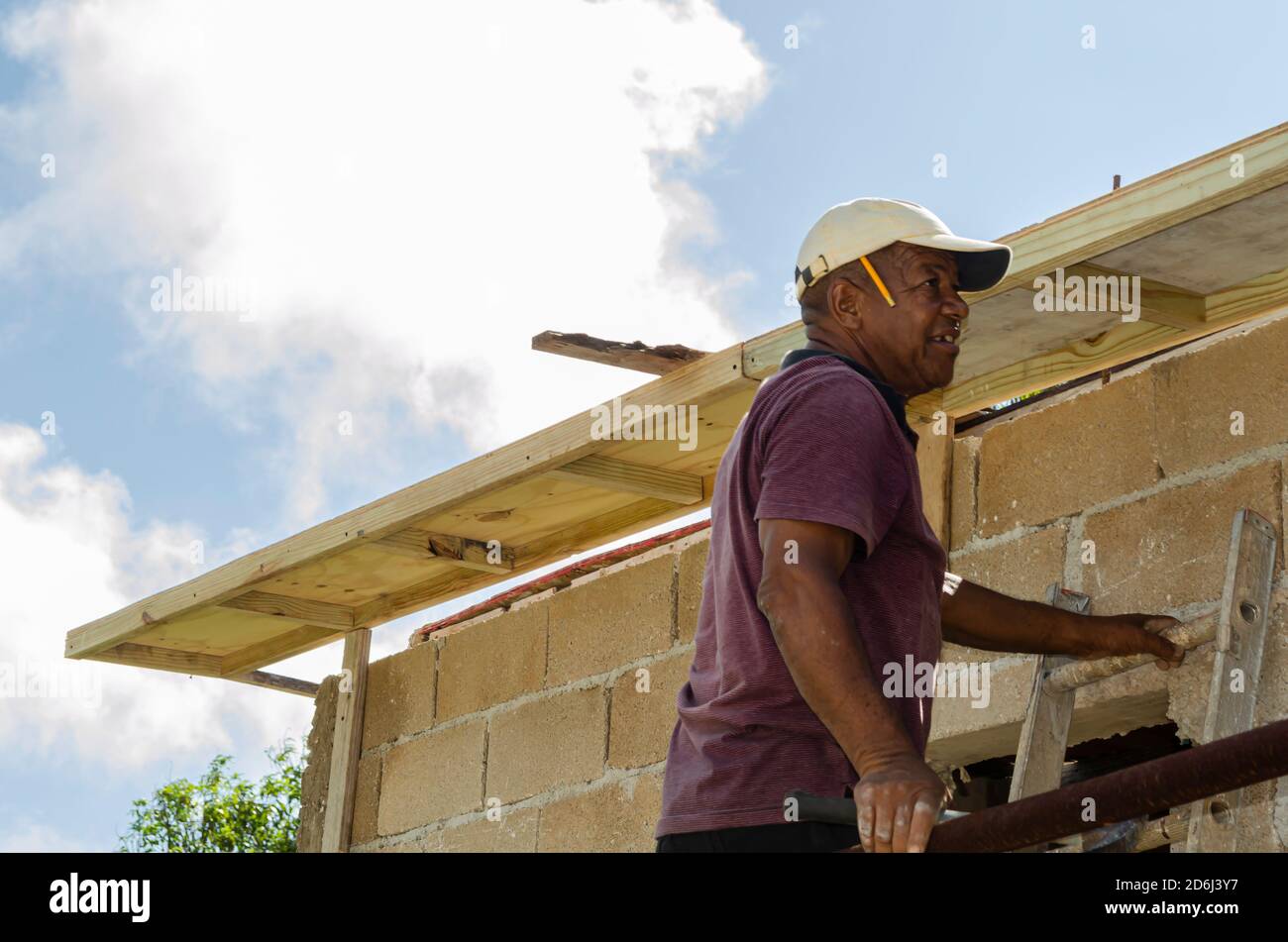 Working From A Ladder Stock Photo - Alamy