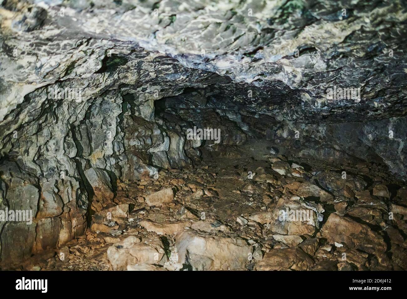 stone cave inside. view near the entrance Stock Photo - Alamy