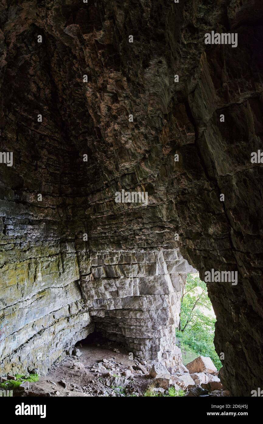 stone cave inside. view near the entrance Stock Photo - Alamy