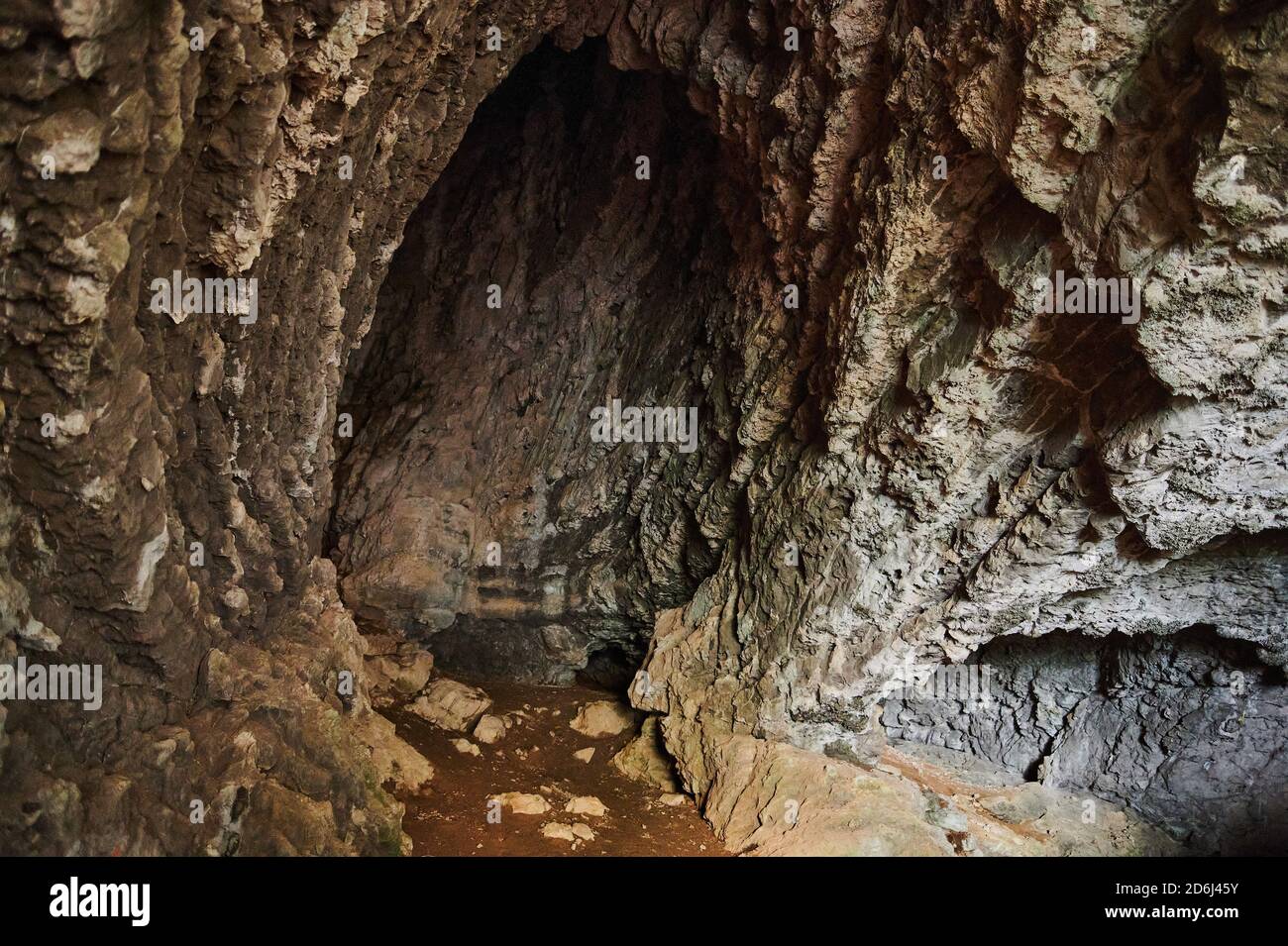 stone cave inside. view near the entrance Stock Photo - Alamy