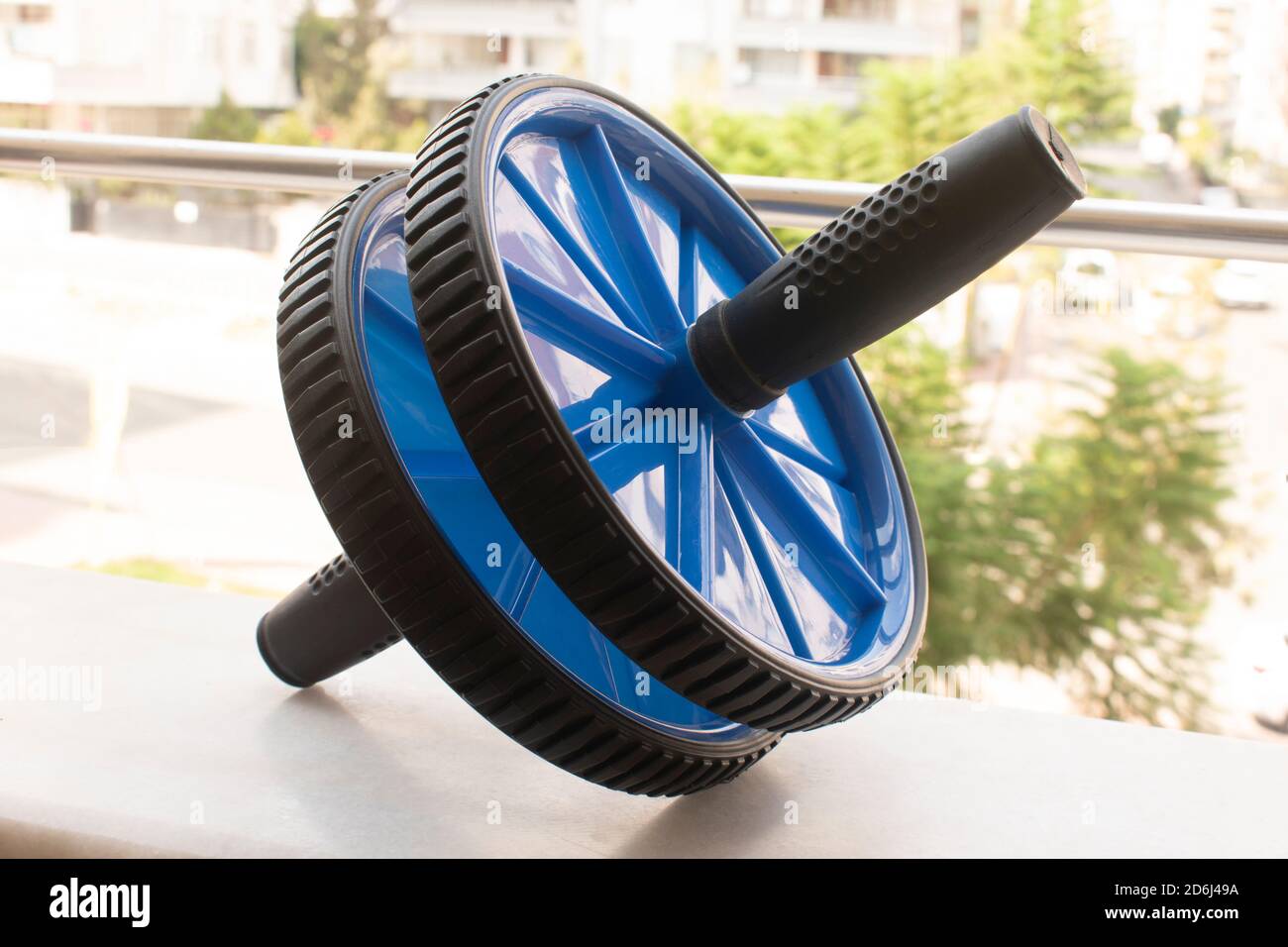 Workout fitness exercise roller, training wheel in balcony view Stock ...