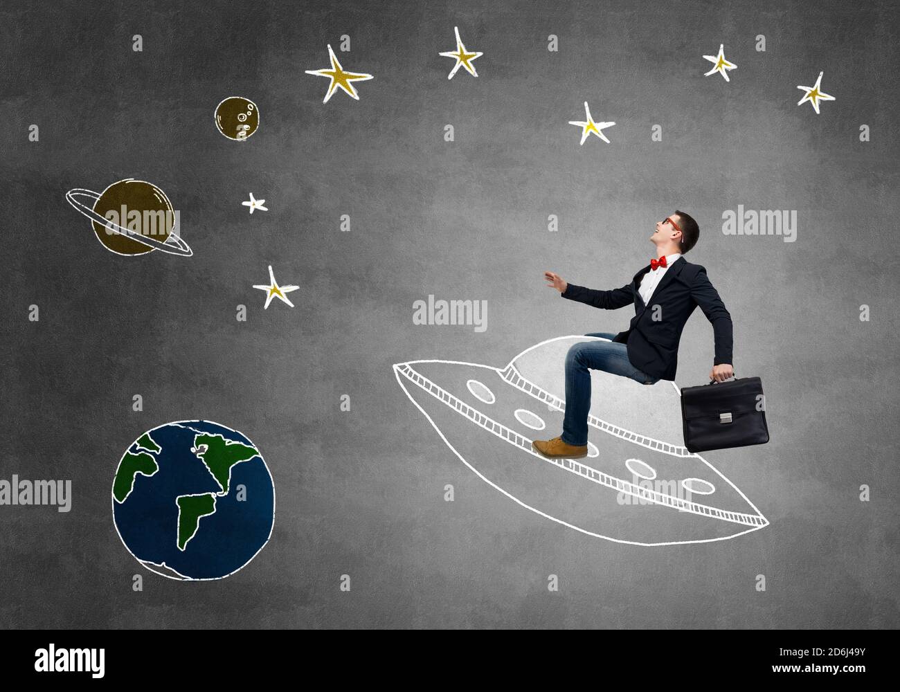 Guy ride UFO ship Stock Photo - Alamy