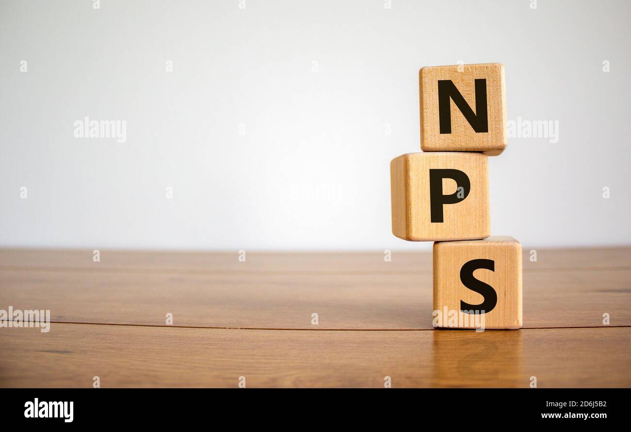 Wood cubes with acronym 'NPS' - 'net promoter score' on a beautiful ...