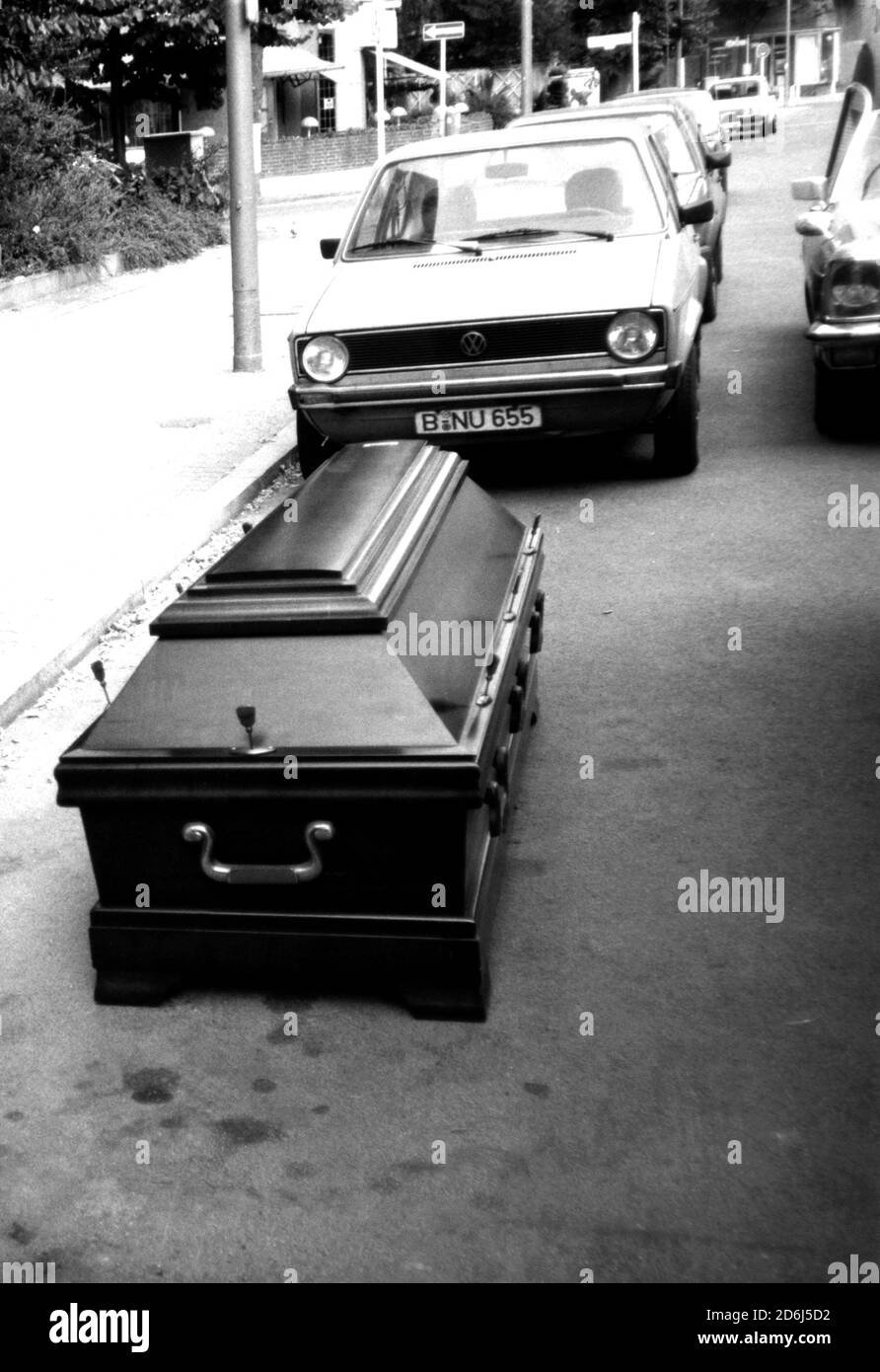 Coffin standing on a parking lot, Berlin, Germany Stock Photo - Alamy