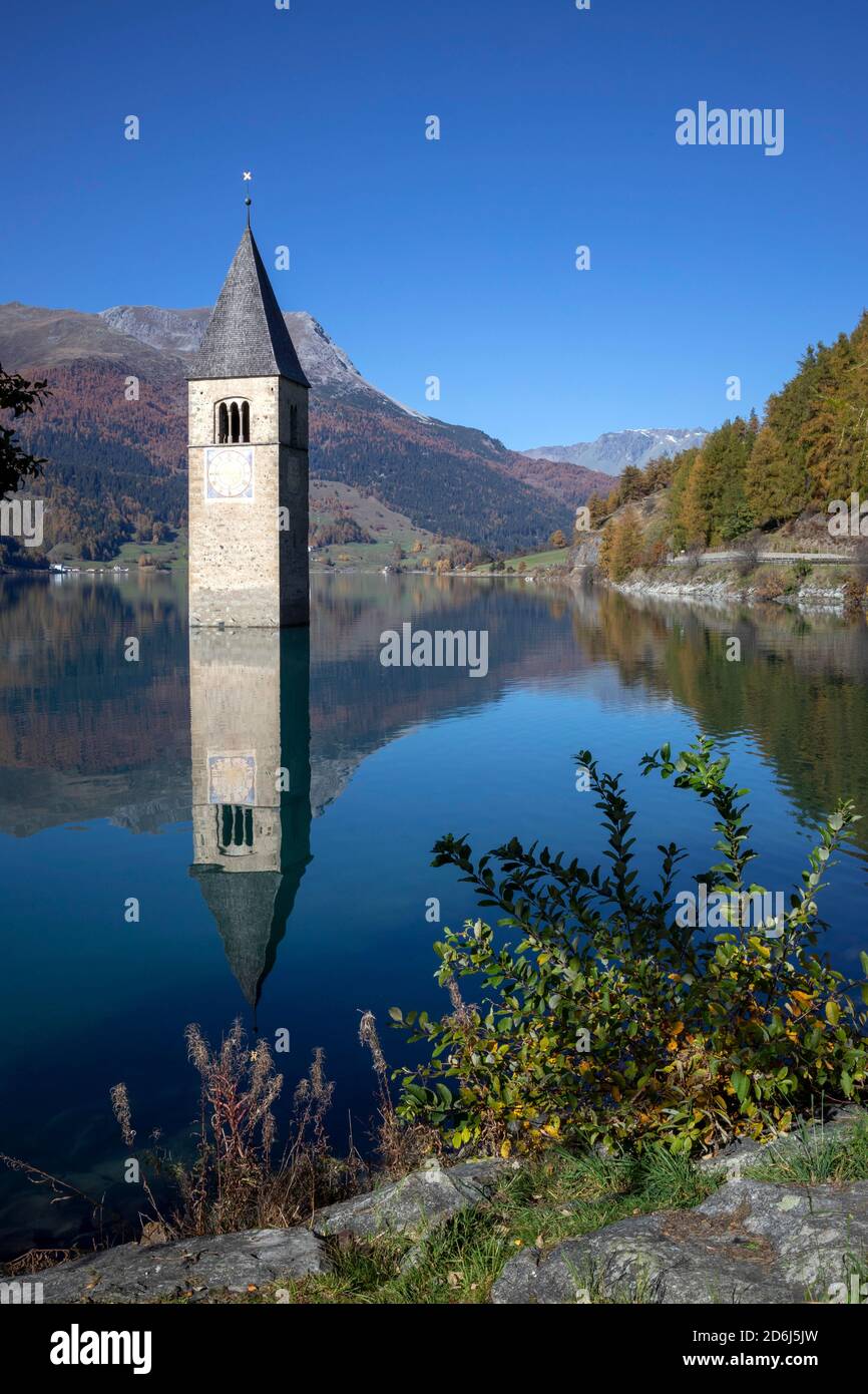 Sunken church tower in the reservoir at the Reschenpass, Graun ...