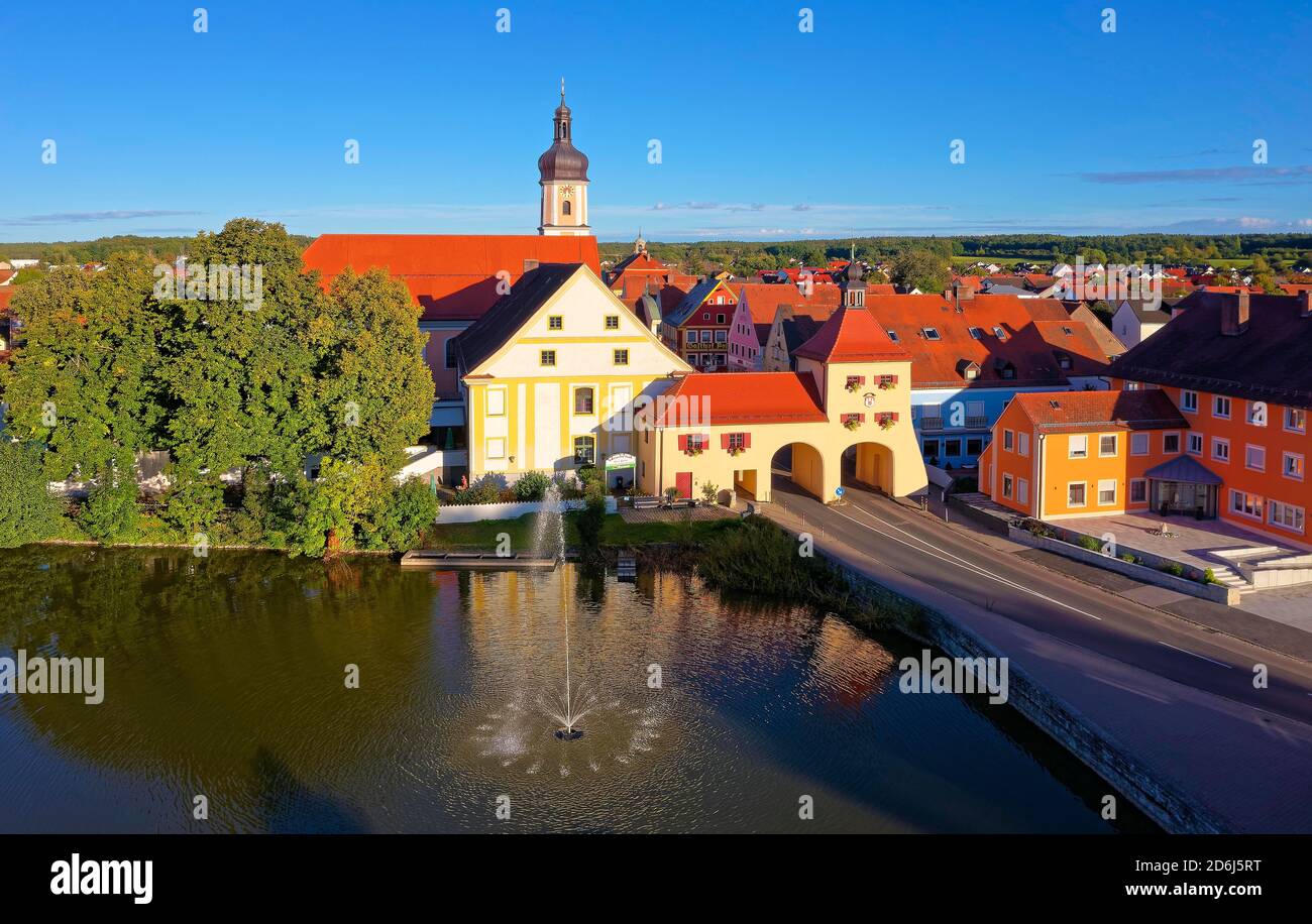 In front hospital pond with fountain, back from left, Catholic parish ...