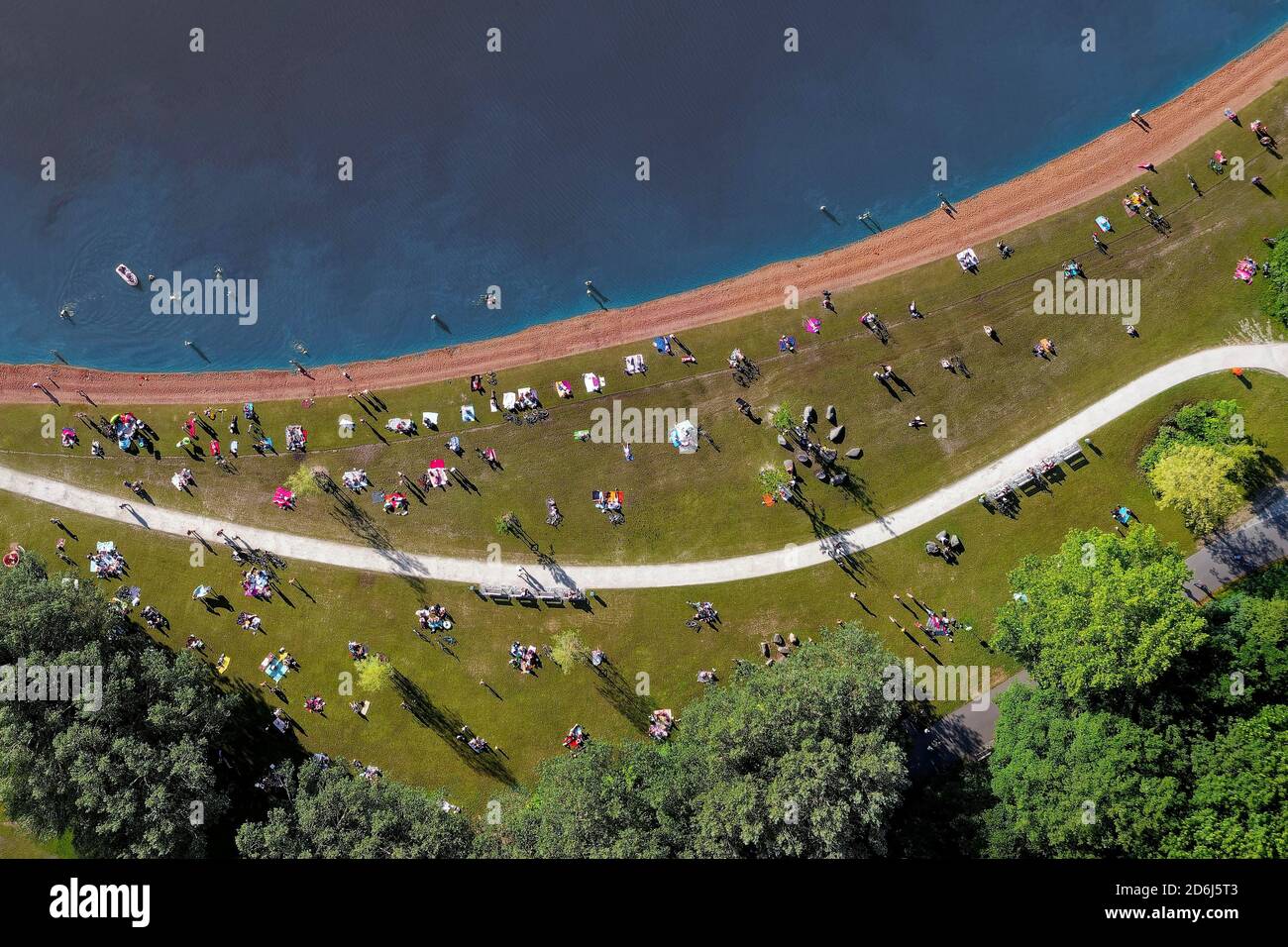 Sandy beach beach and sunbathing lawn with bathers hi-res stock ...