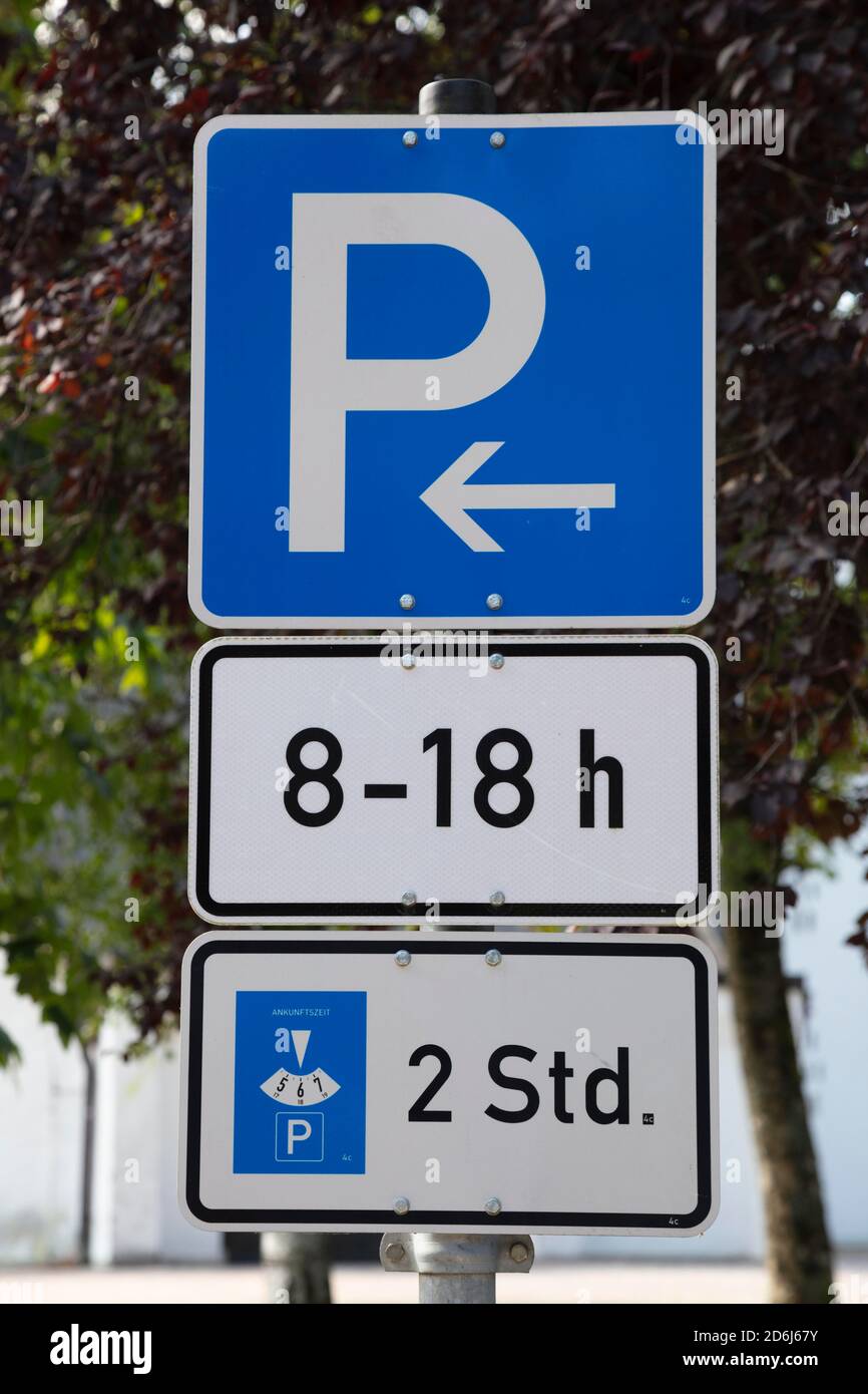 Sign parking place left, 8-18 h, with parking disc, Germany Stock Photo ...