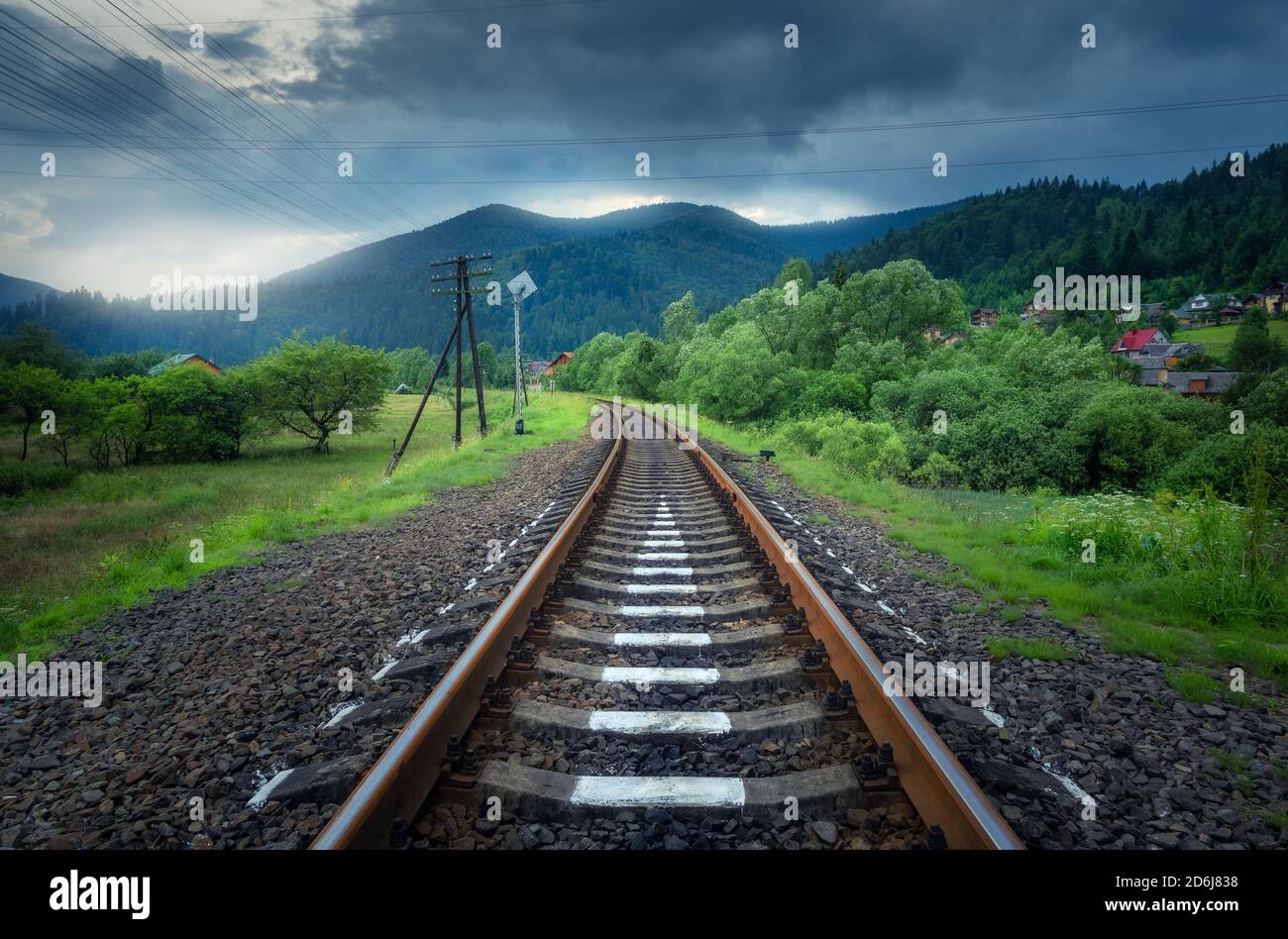Rural railroad in mountains in overcast day. Old railway Stock Photo ...