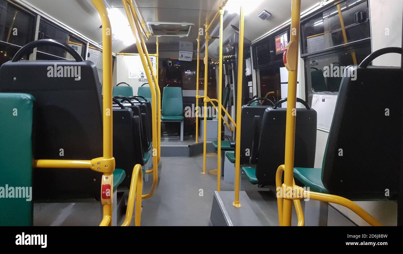 An empty bus is equipped with handrails for holding it on the inside ...