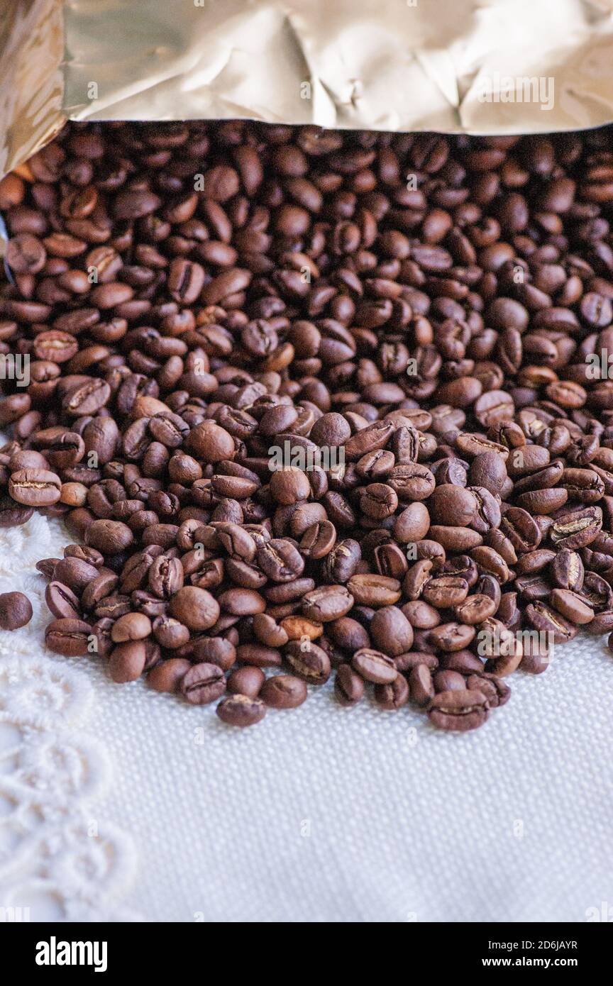 Coffee beans background. Light roasted natural coffee beans. Morning ...