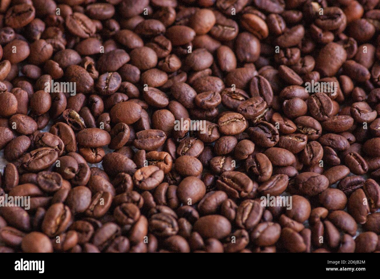 Coffee beans background. Light roasted natural coffee beans. Morning ...