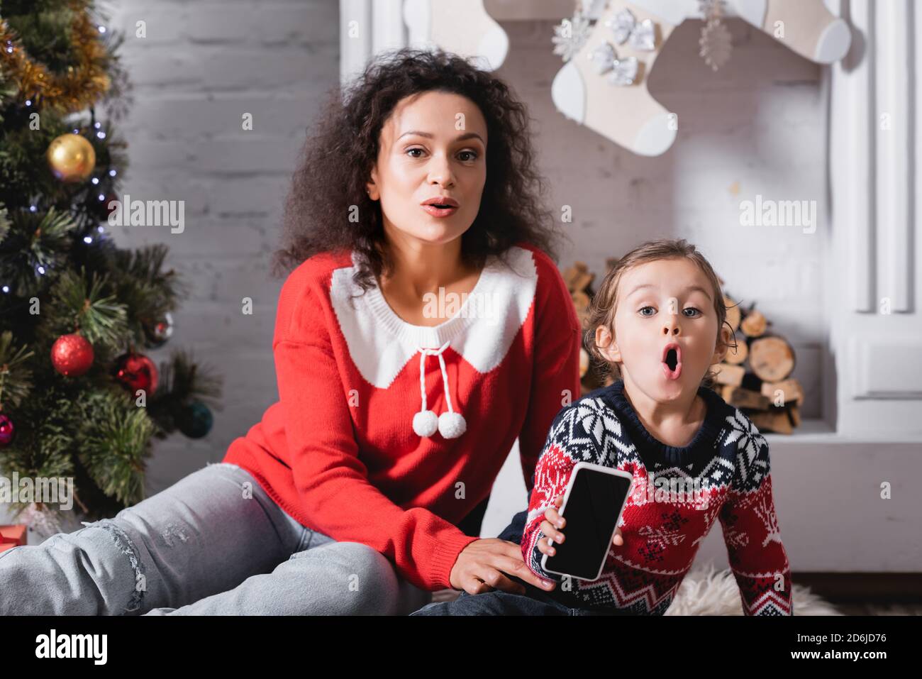 Surprised mother sitting daughter hi-res stock photography and images ...