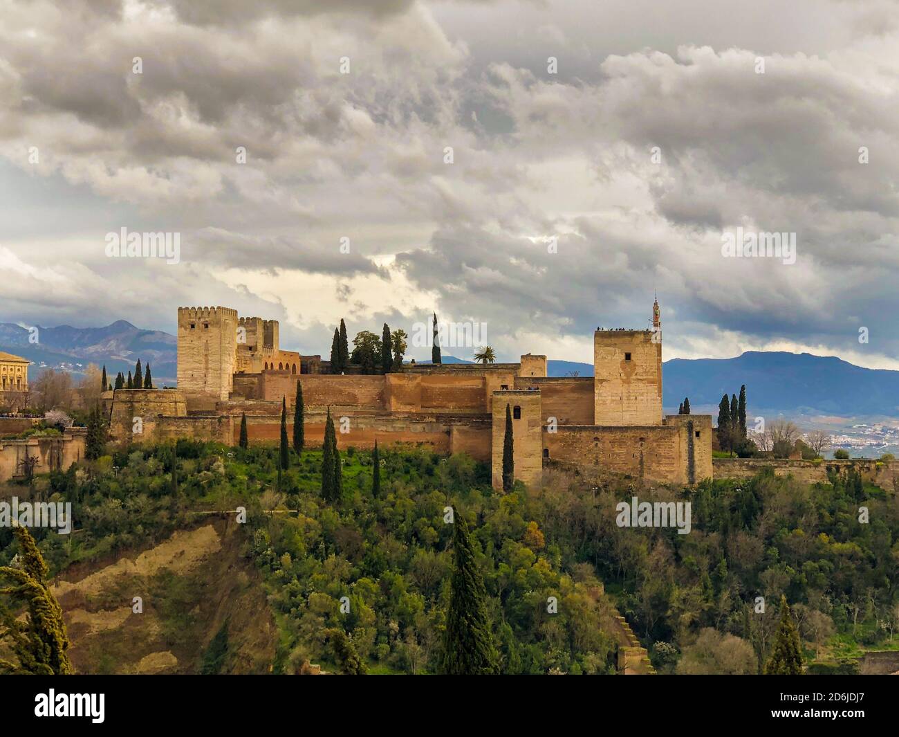 The magnificent Moorish Palace and Fortress of Alhambra with moody ...