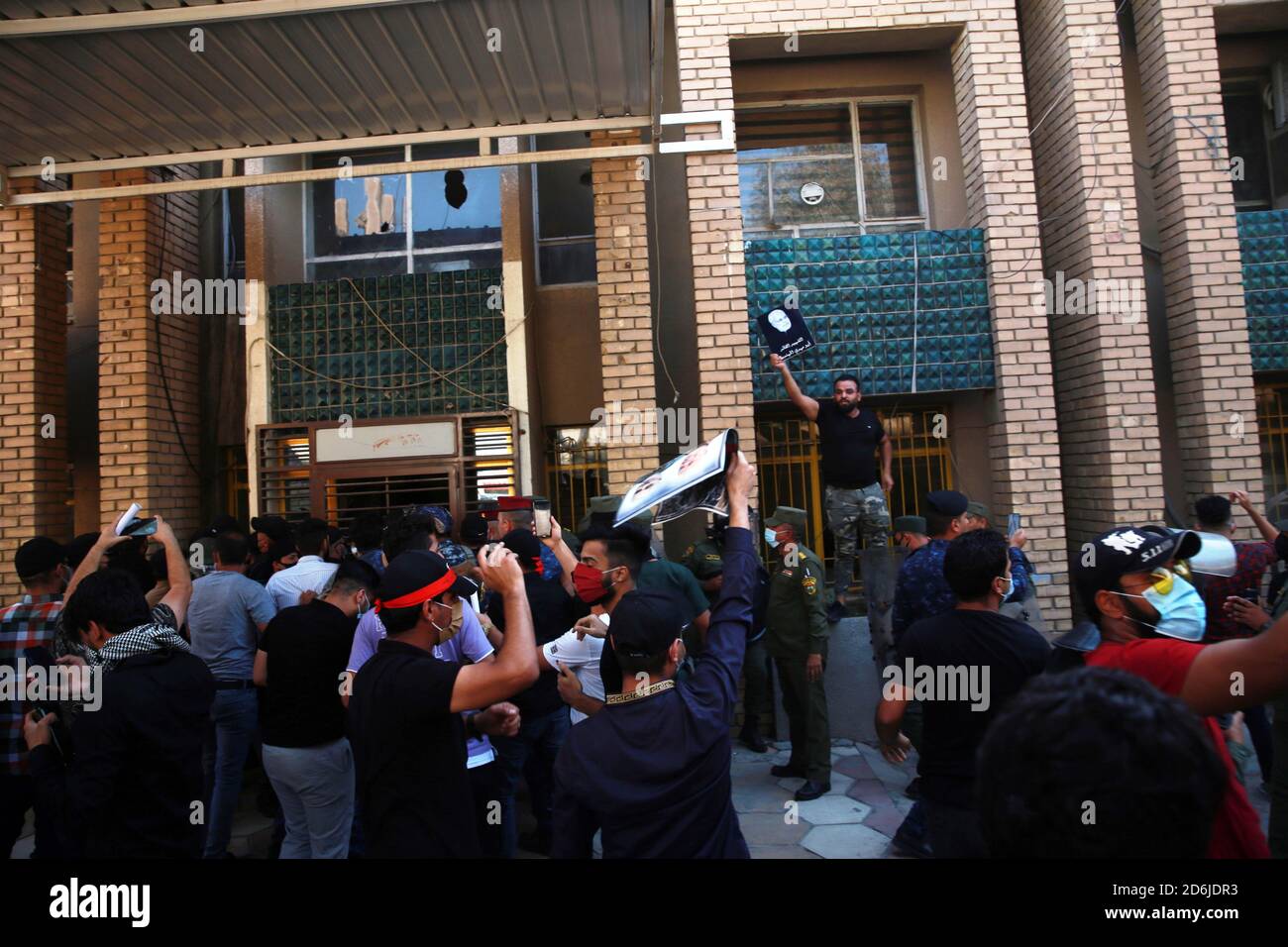 Baghdad. 17th Oct, 2020. Protesters are seen at the headquarters of the ...