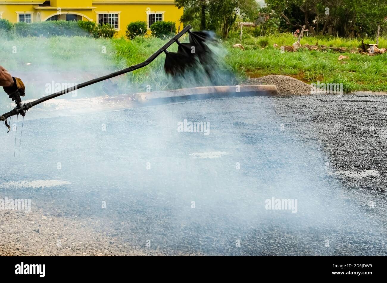 Sealcoating spray apparatus hi-res stock photography and images - Alamy