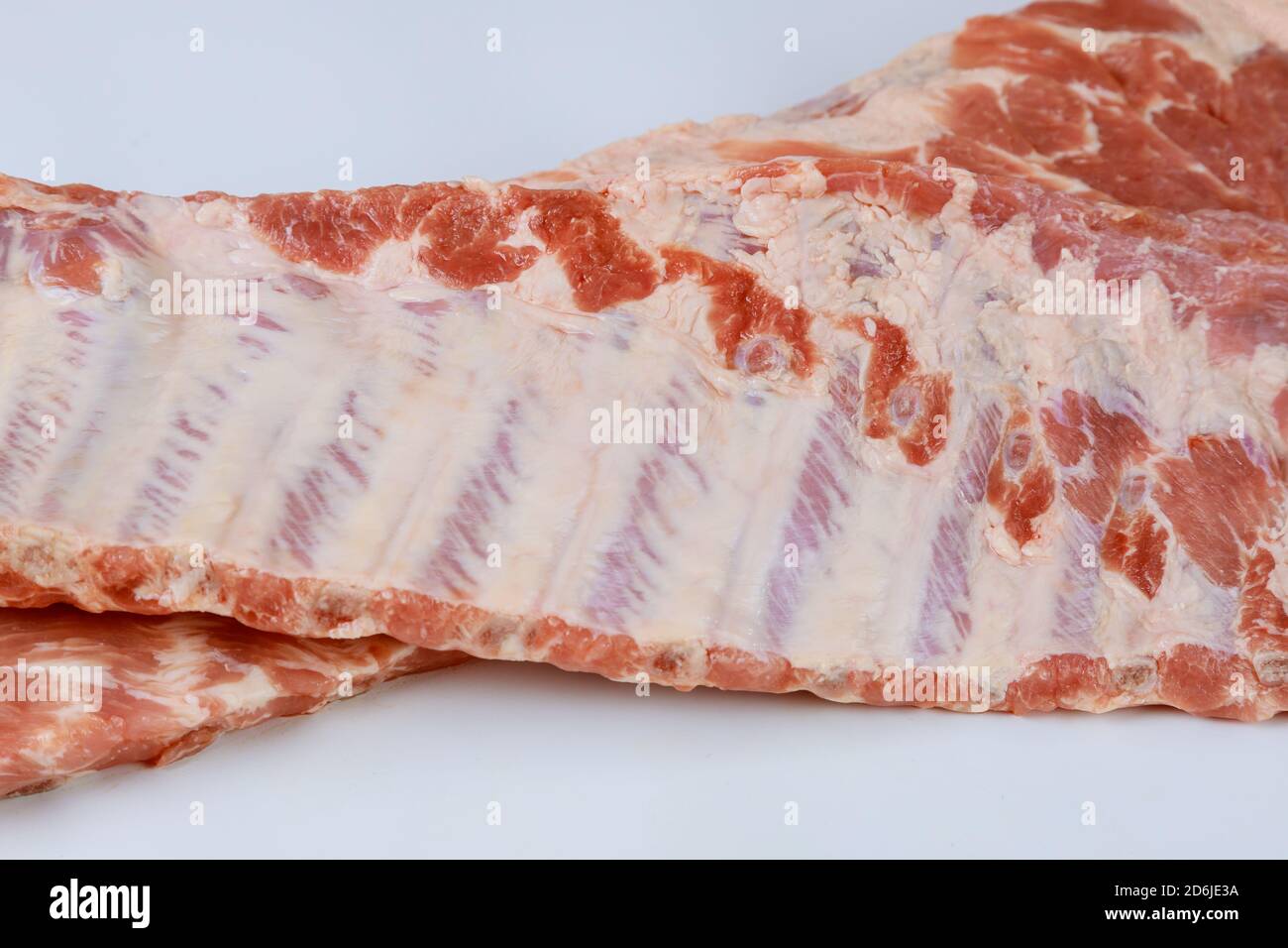 Raw pork ribs ribs isolated on white background Stock Photo - Alamy