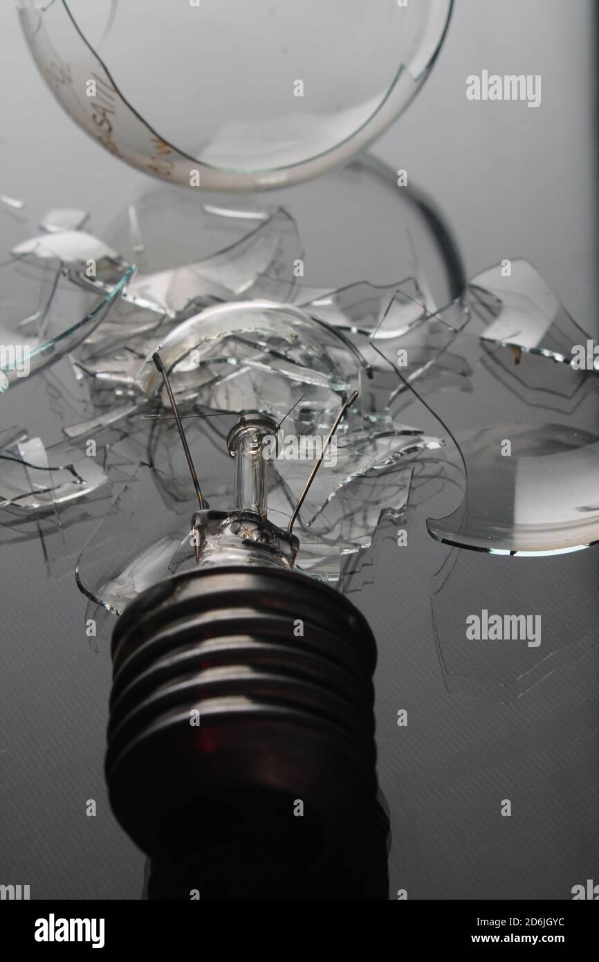 Broken glass on a gray background hi-res stock photography and images ...