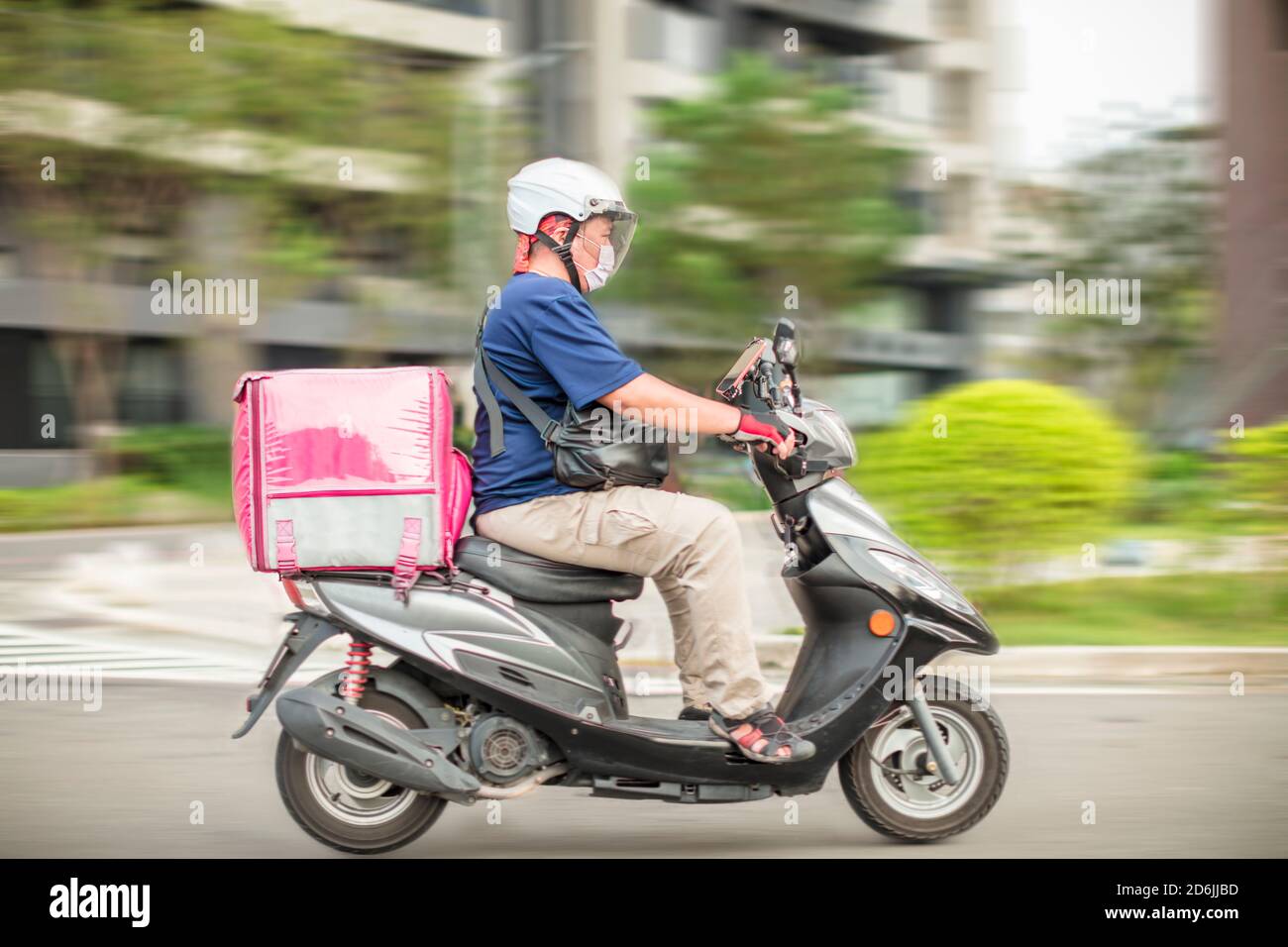 Food delivery motorcycle scooter hi-res stock photography and images ...