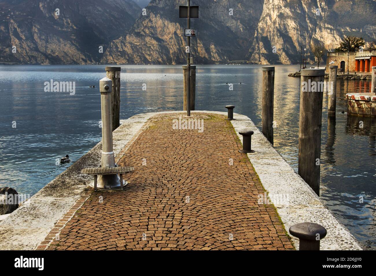 Seaside pier with wooden posts Stock Photo - Alamy