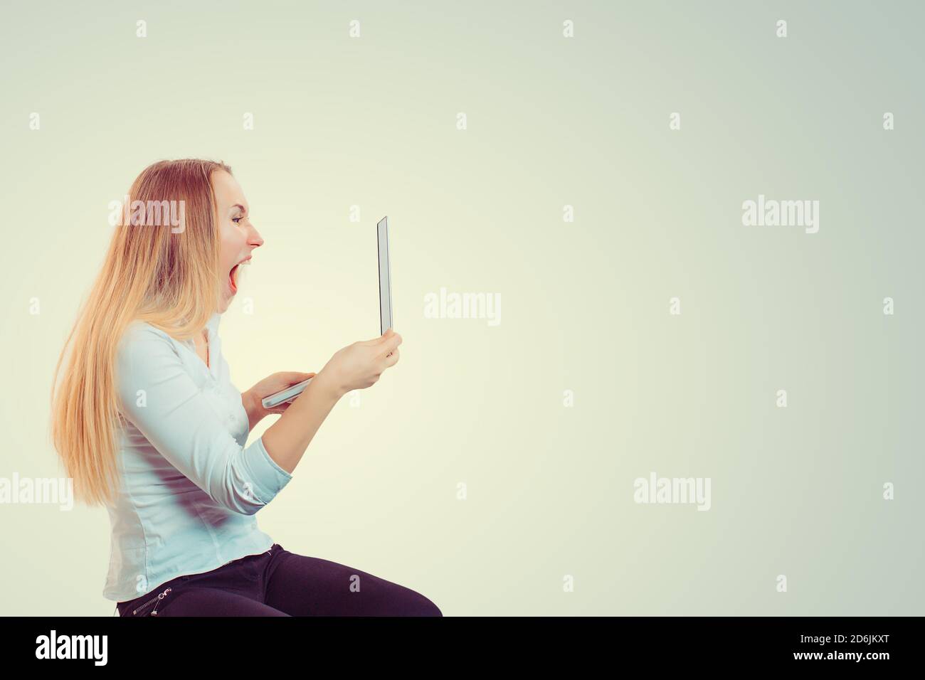 Angry furious businesswoman working on computer, screaming isolated on ...