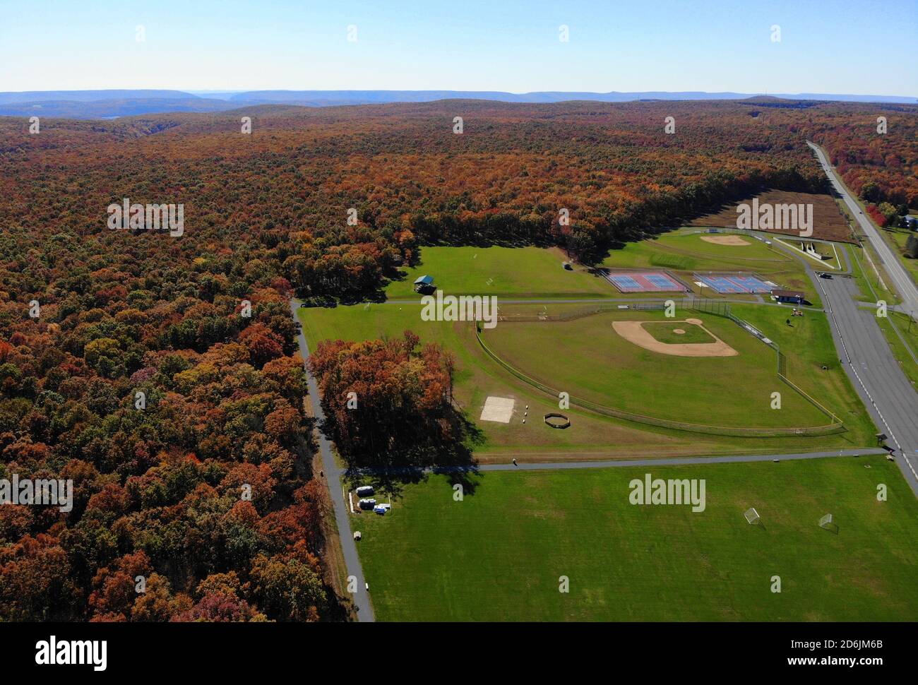 The aerial view of the stunning fall foliage and the baseball field on ...