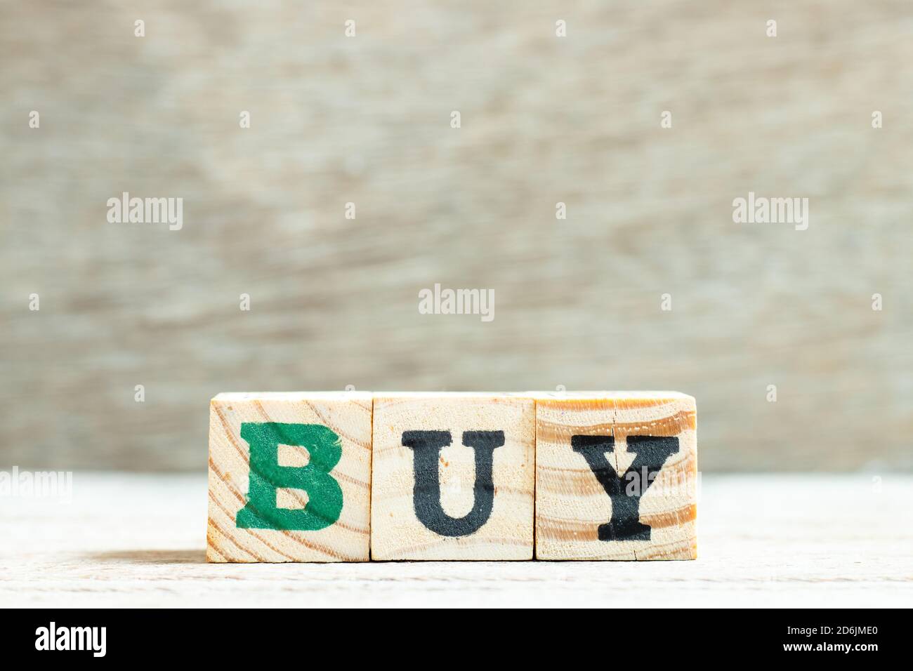 Alphabet letter in word buy on wood background Stock Photo - Alamy