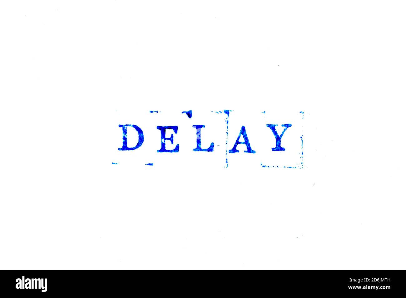 Blue color ink of rubber stamp in word delay on white paper background ...
