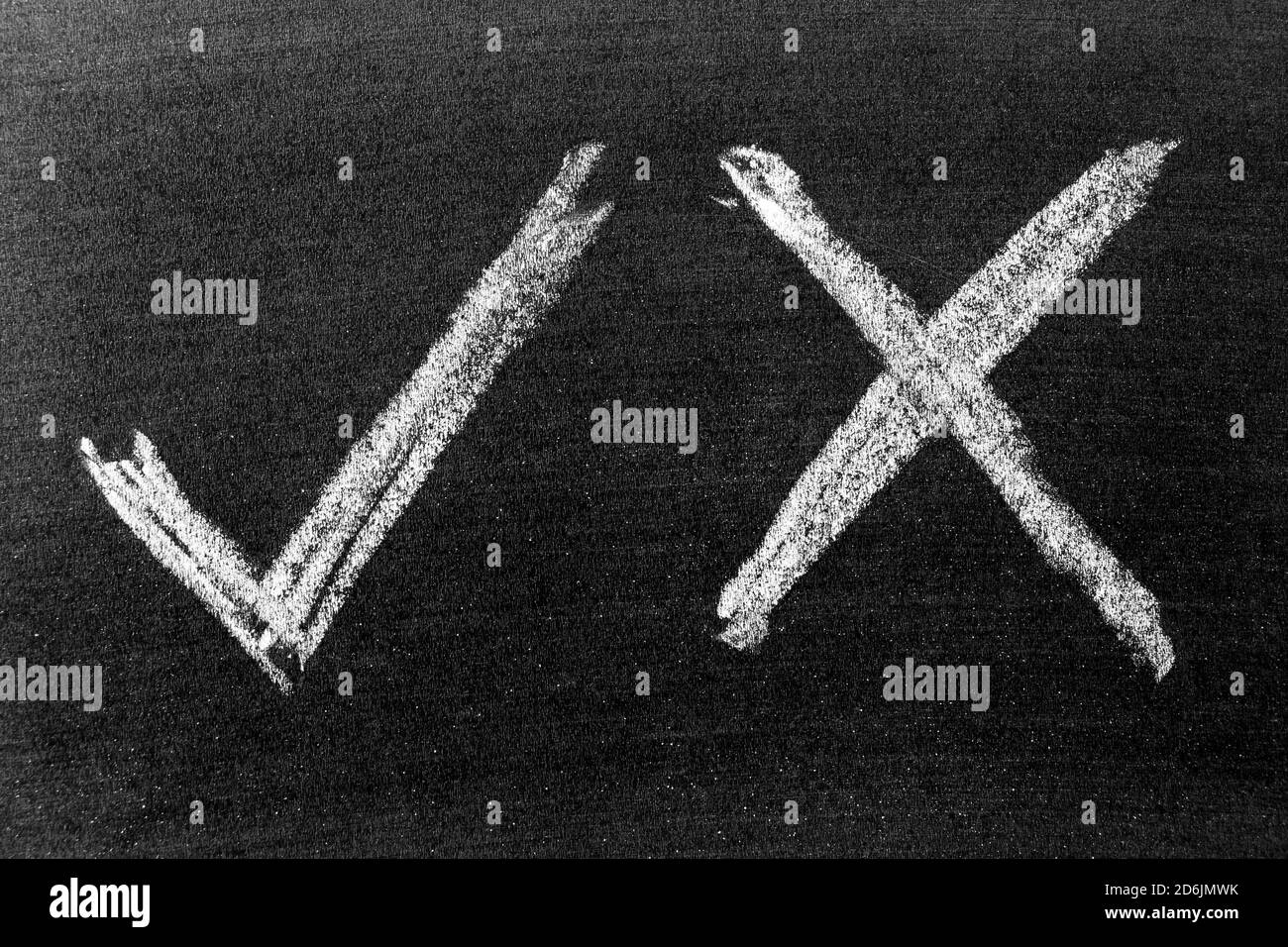 White color chalk hand drawing in check mark of right and wrong shape ...