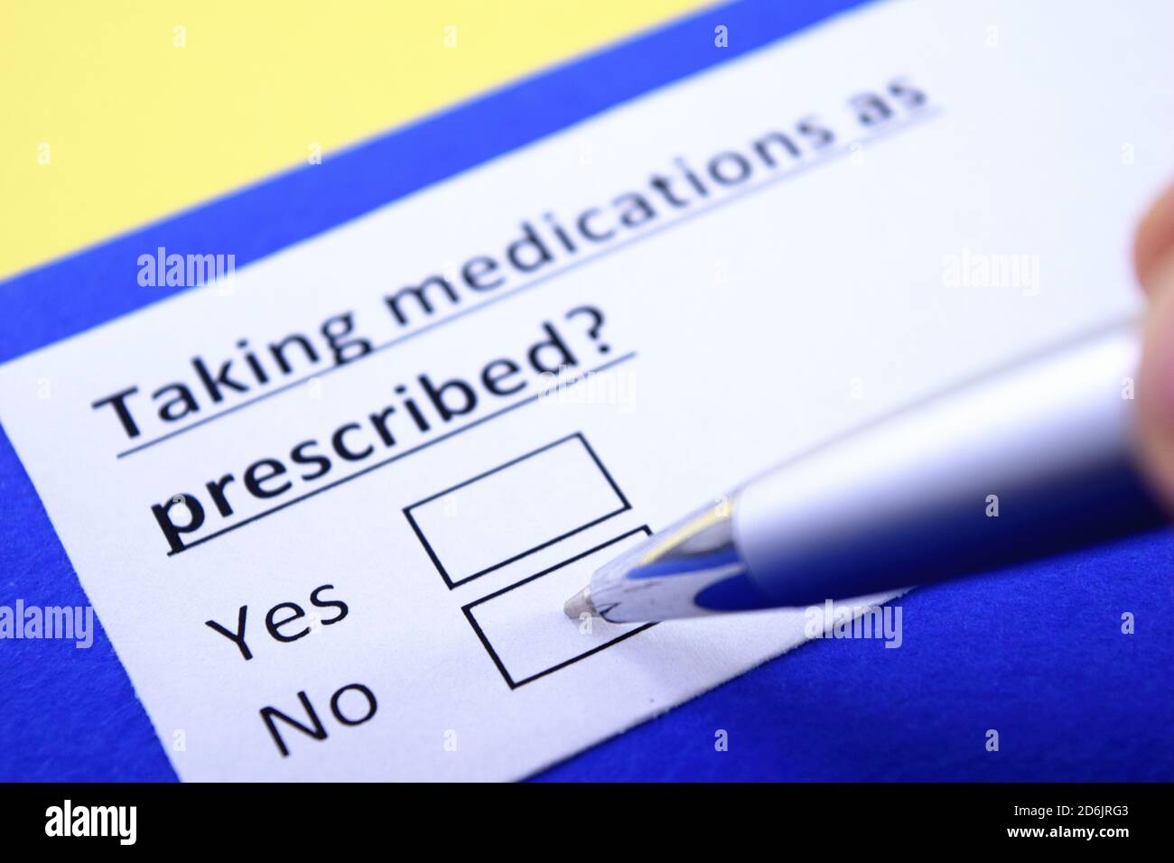 Taking medications as prescribed? Yes or no Stock Photo - Alamy