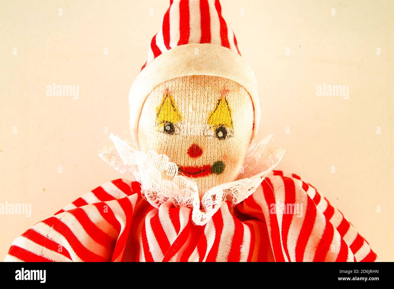 Pierrot toy doll on white background Stock Photo - Alamy