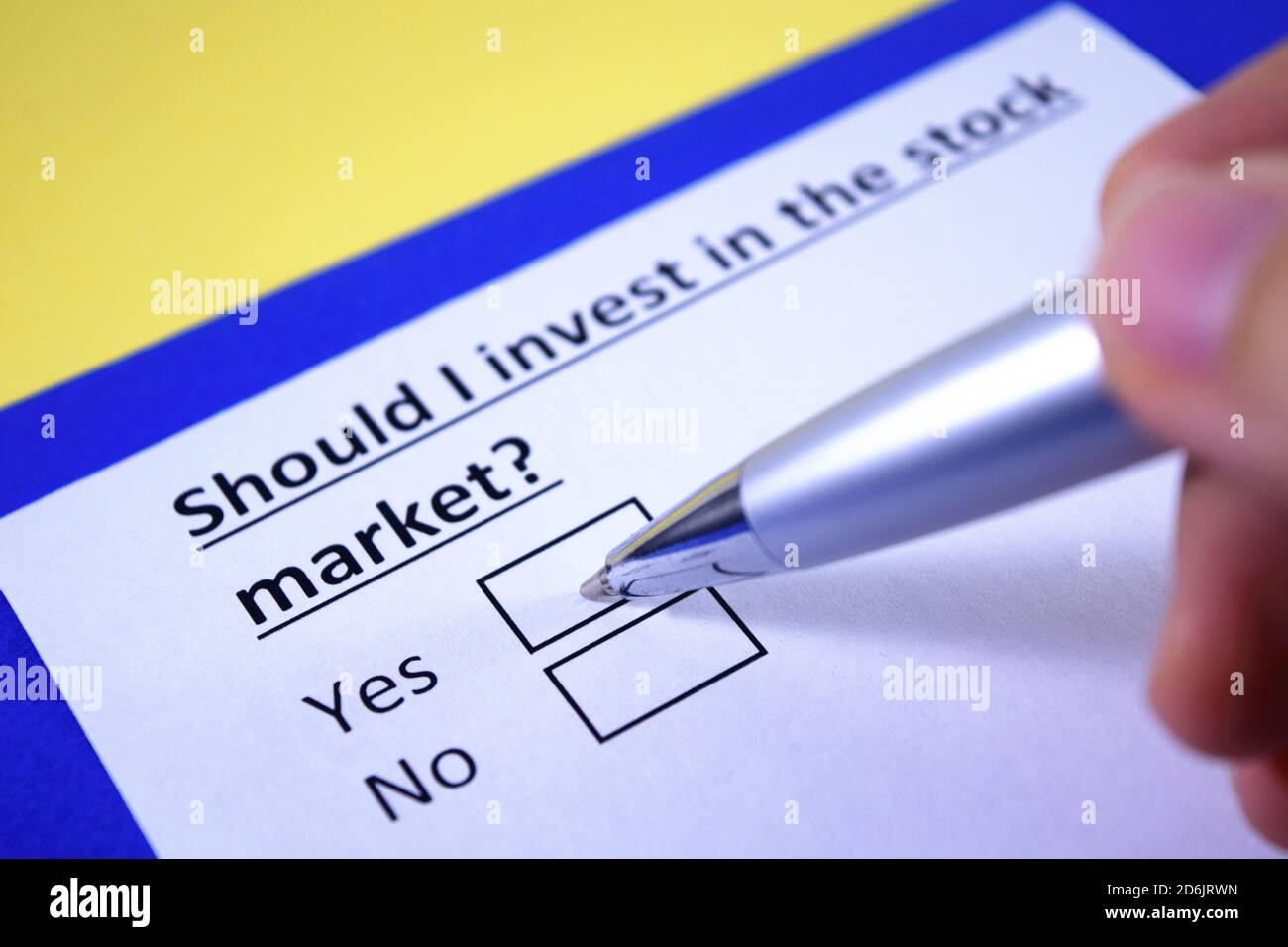 Should I invest in the stock market? Yes or no Stock Photo - Alamy