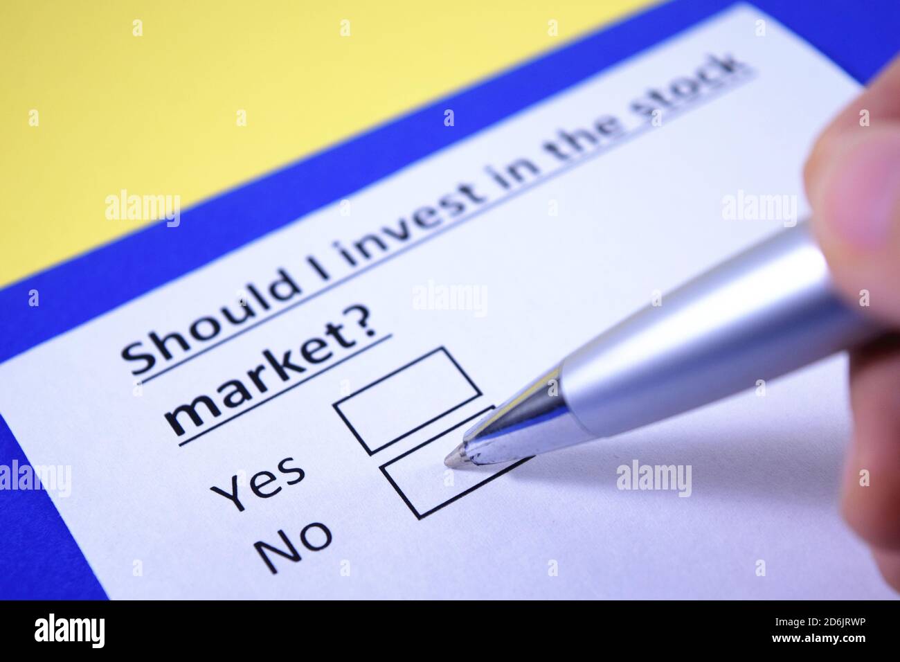 Should I invest in the stock market? Yes or no Stock Photo - Alamy