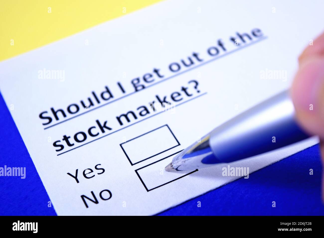 Should I get out of the stock market? Yes or no Stock Photo - Alamy