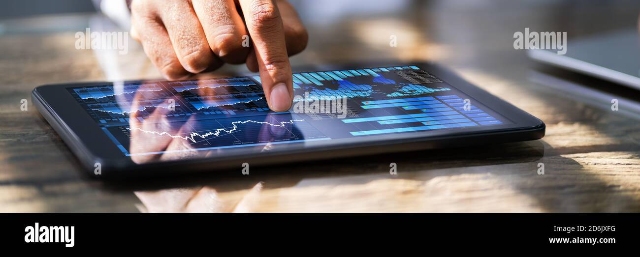 African Advisor Using Tablet With KPI Graph Stock Photo - Alamy
