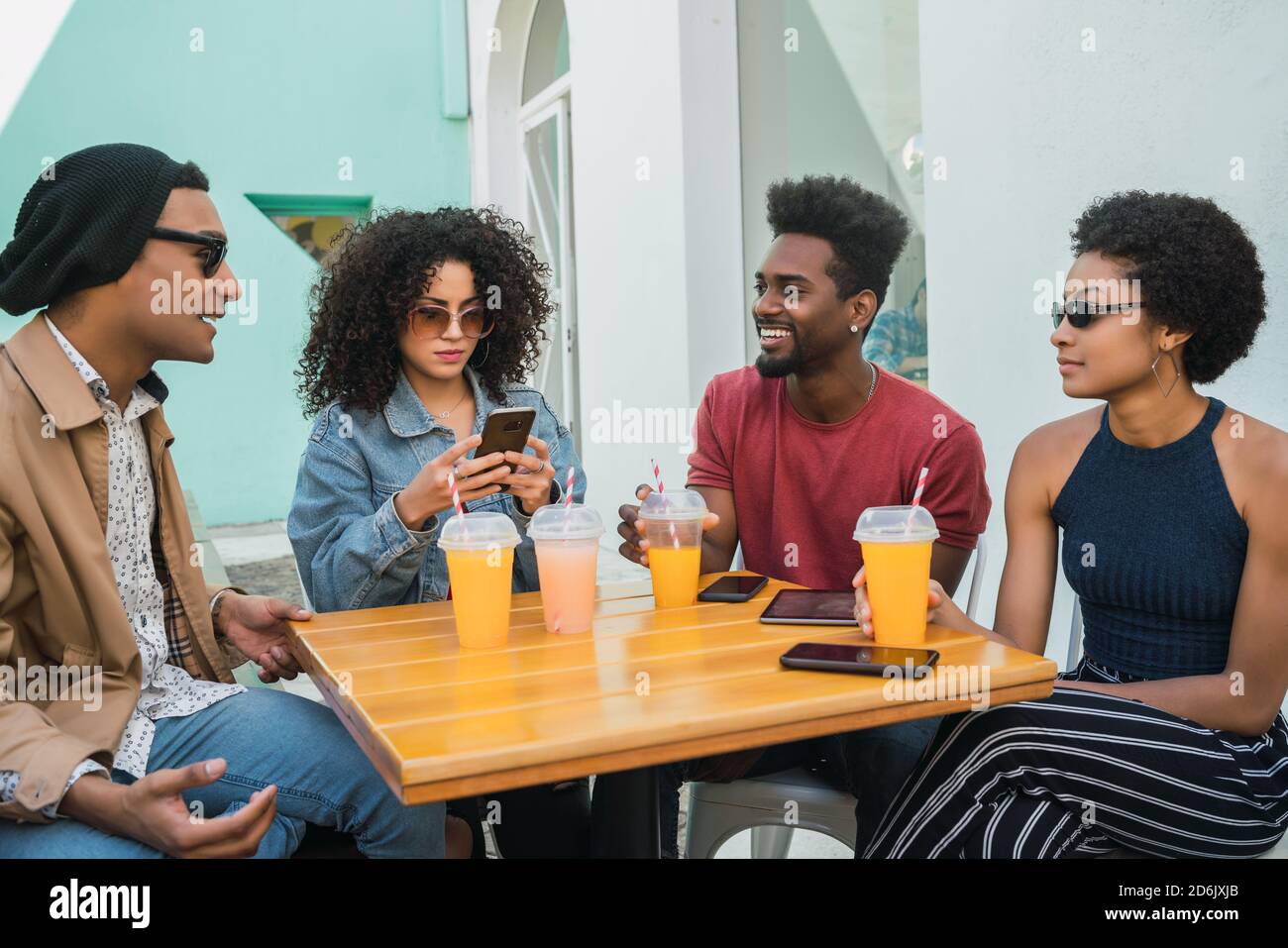 Portrait of Afro friends having fun together and enjoying good time ...