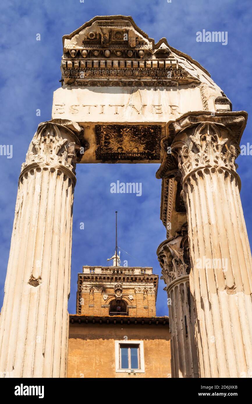 The Tabularium building peeking through the columns of the Temple of ...