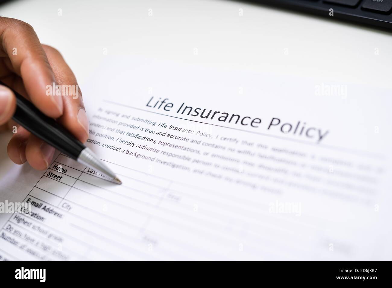 African American Applying For Life Insurance Policy Stock Photo - Alamy