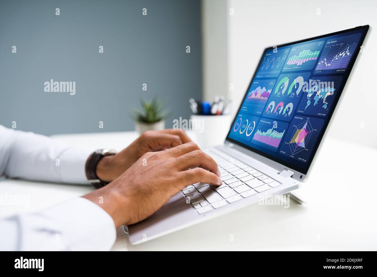 Business Data Analyst Using Computer. African American Advisor Stock ...